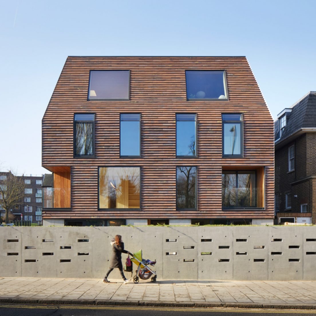 Black-stained timber canopy encloses garden pavilion by Tikari Works ...